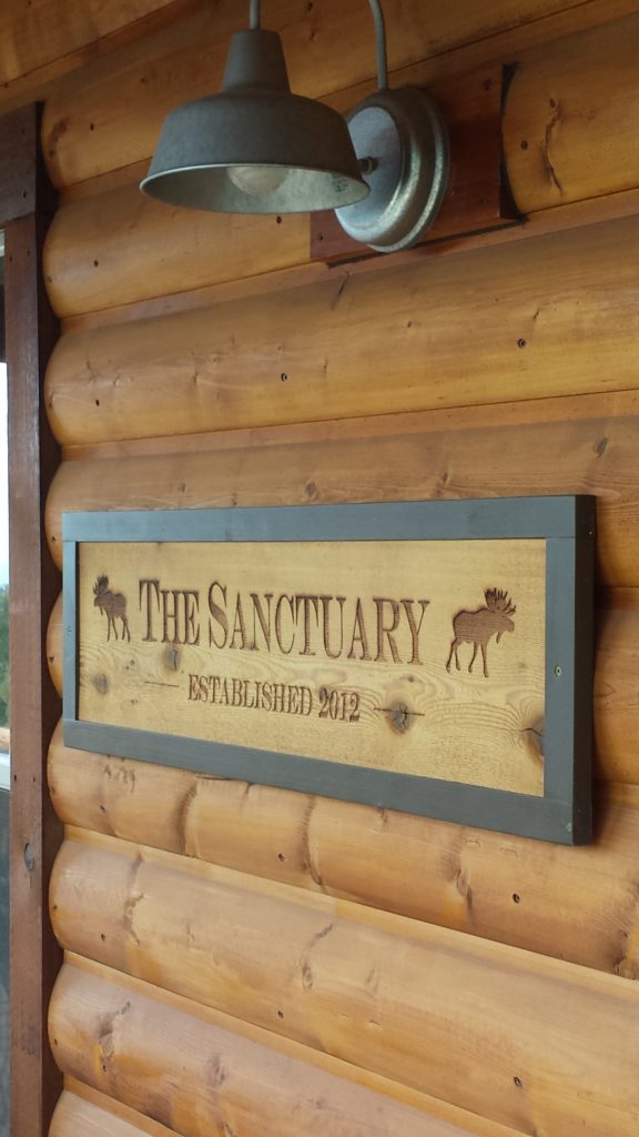 Sanctuary sign hanging - Echoes of Grace